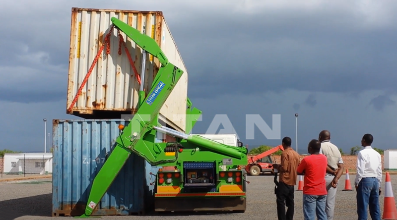 How the container side loader is transported?